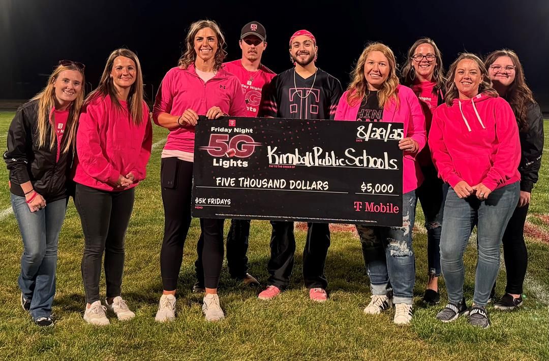 T-Mobile representatives present $5K check to Kimball High School ...